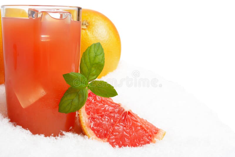Grapefruit Juice with Ice and Quarter with Mint on Ice on White Stock ...