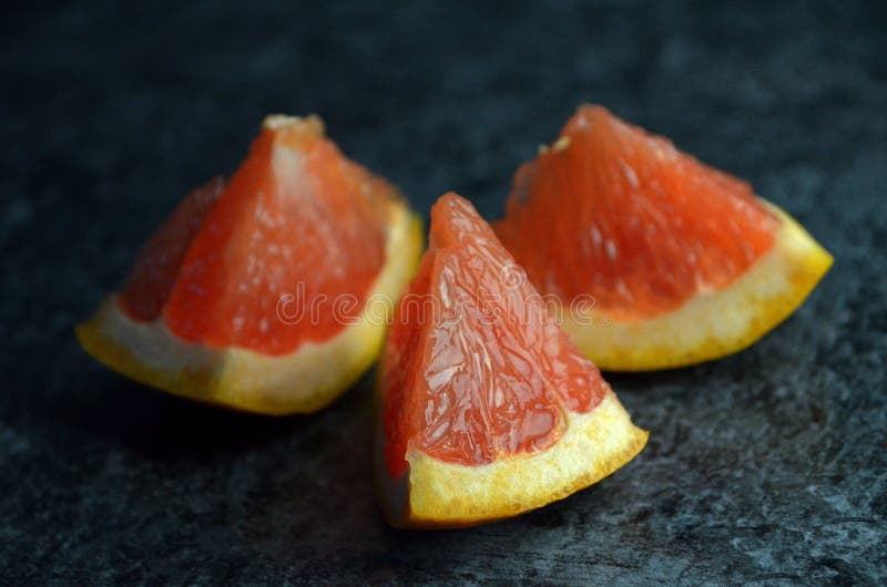Grapefruit pieces stock photo. Image of fruits, group - 72479512