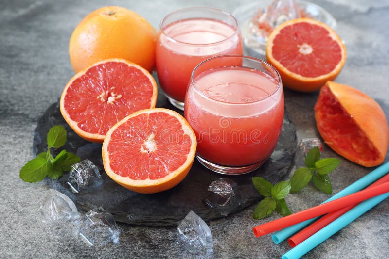 Grapefruit Pulp Juice and Grapefruit Halves Stock Image - Image of ...