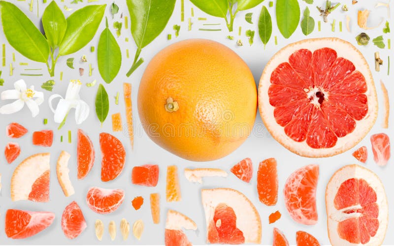 Grapefruit Slice and Leaf Collection Stock Photo - Image of grapefruit ...