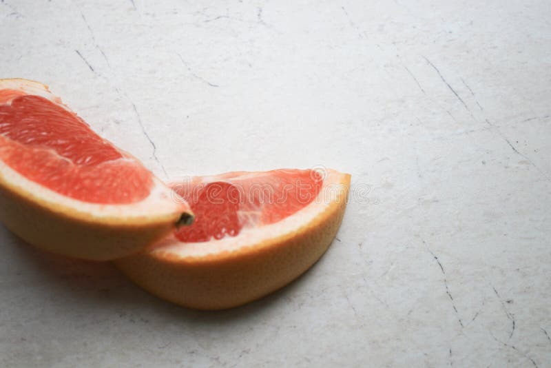Grapefruit slices stock image. Image of knife, grapefruit - 157141221