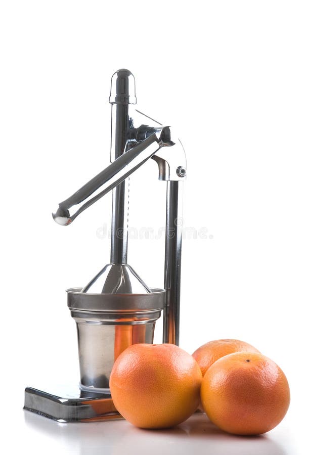 Grapefruit and squeezer stock image. Image of closeup - 12250601