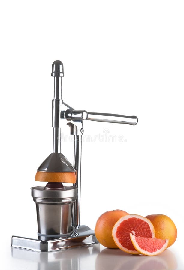 Grapefruit and squeezer stock photo. Image of grapefruit - 12601728