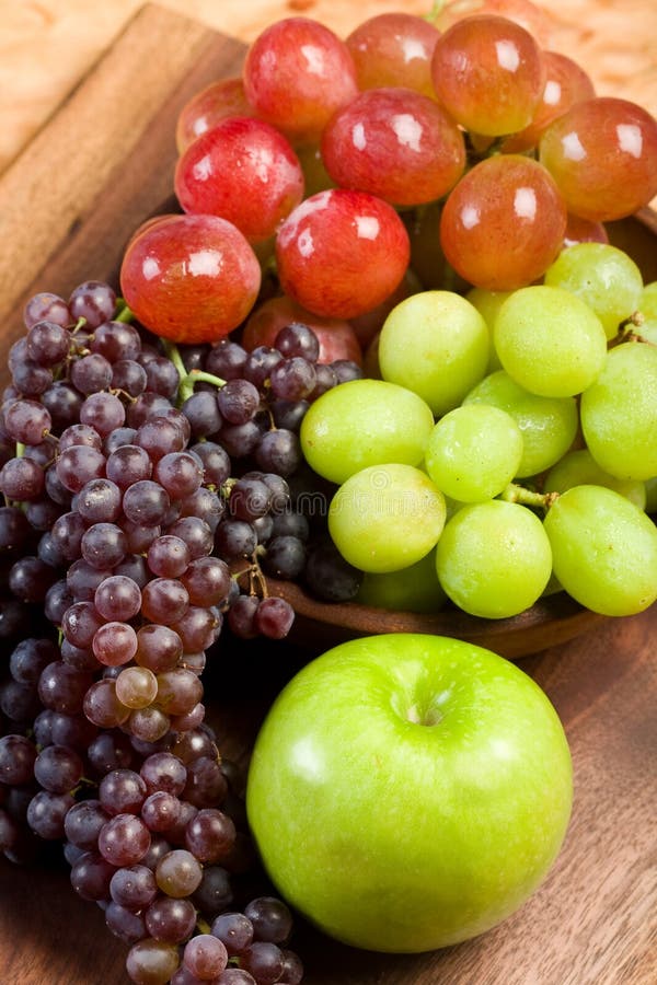 Grapes and Apple stock image. Image of apple, globe, grapes - 10403233