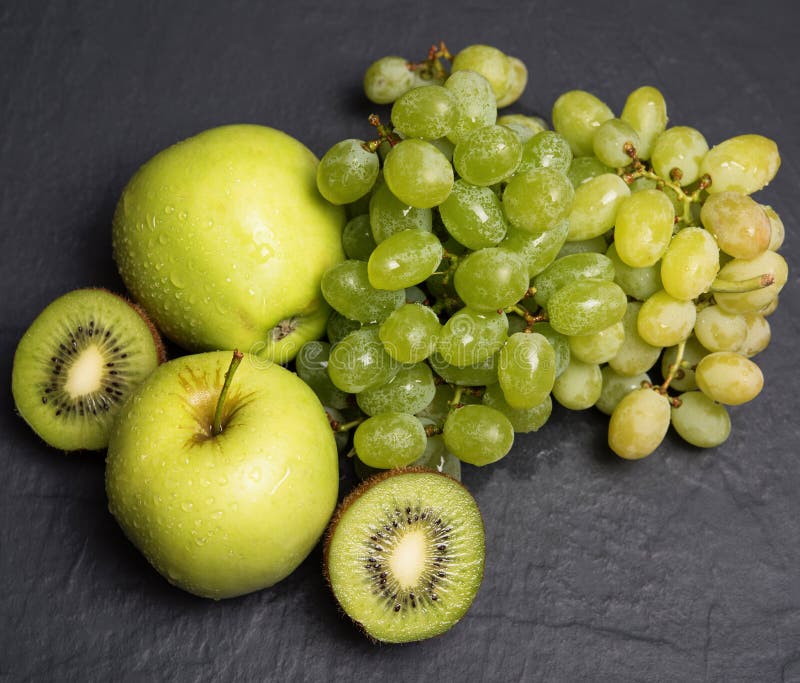 Grapes with an Apple stock image. Image of drops, slimming - 88444349