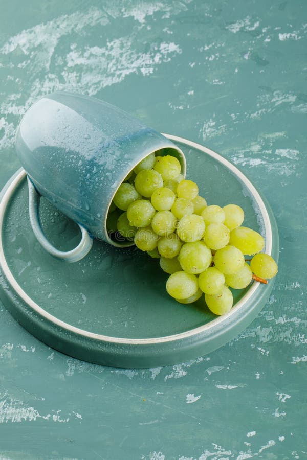 Grapes in a Cup on Plaster and Tray Background. High Angle View Stock ...