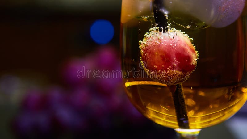 Grapes Floating in Champagne Creating Lots of Bubbles Stock Image ...