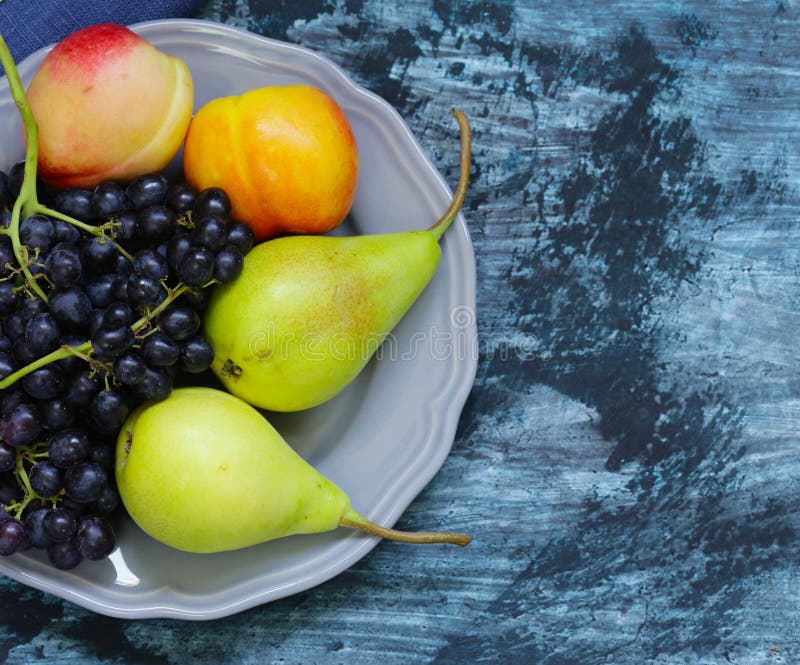 Grapes, pears, peaches stock image. Image of peaches - 97003379
