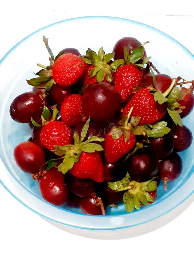 Grapes and Strawberries in One Bowl Stock Photo - Image of bowl, dish ...
