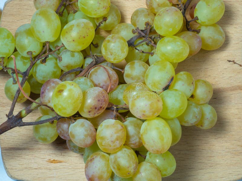 Grapes on the Table. White Background. Kishmish on a White Background ...