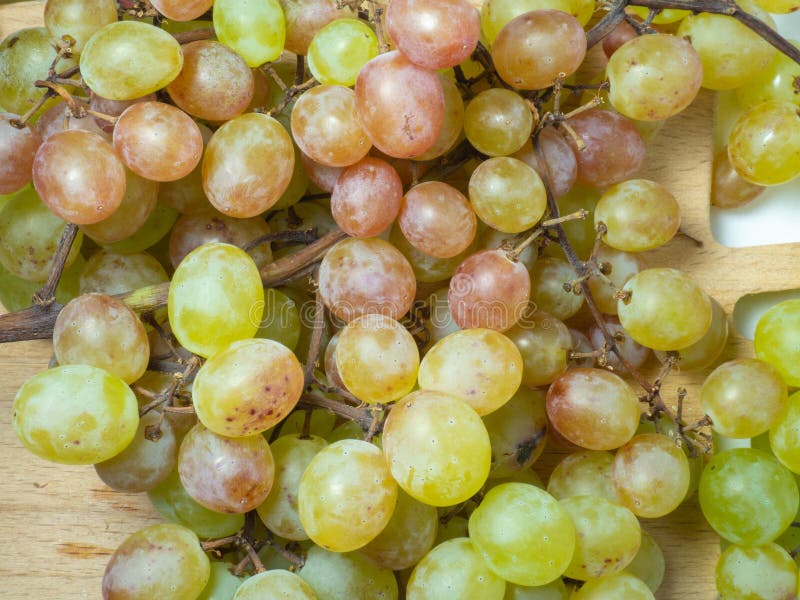 Grapes on the Table. White Background. Kishmish on a White Background ...