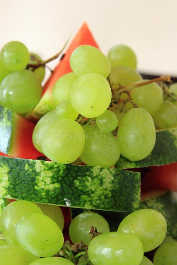 Grapes and watermelon stock image. Image of sweet, tropical - 43535311