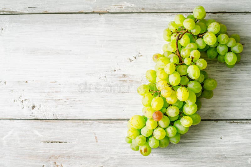 Grapes on the White Wooden Table Top View Stock Image - Image of ...