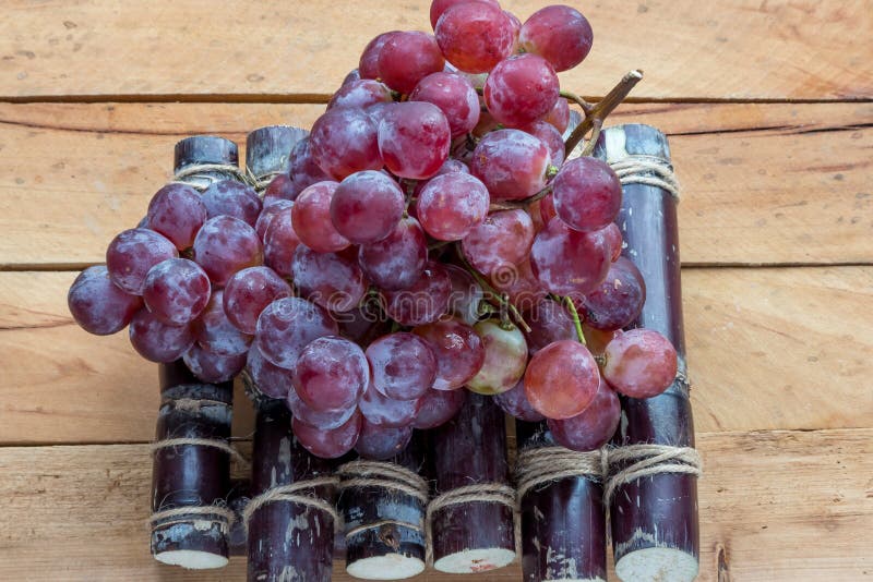 Grapes on wooden table. stock photo. Image of food, healthy - 76881718