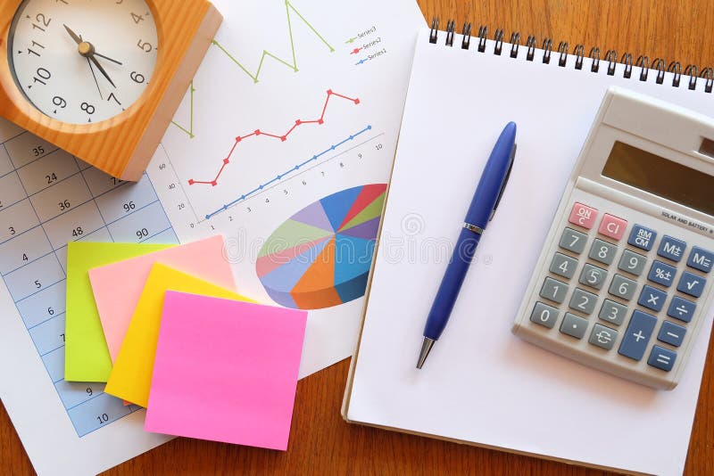 Graph paper and calculator stock image. Image of accounting - 97419361