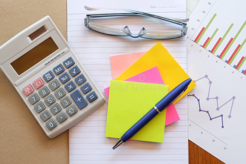 Graph paper and calculator stock image. Image of account - 97419741