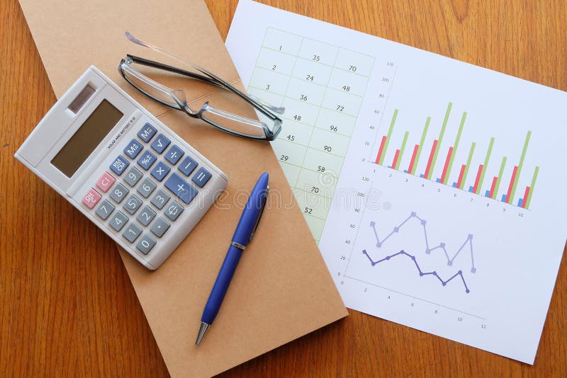 Graph paper and calculator stock photo. Image of concepts - 97419766