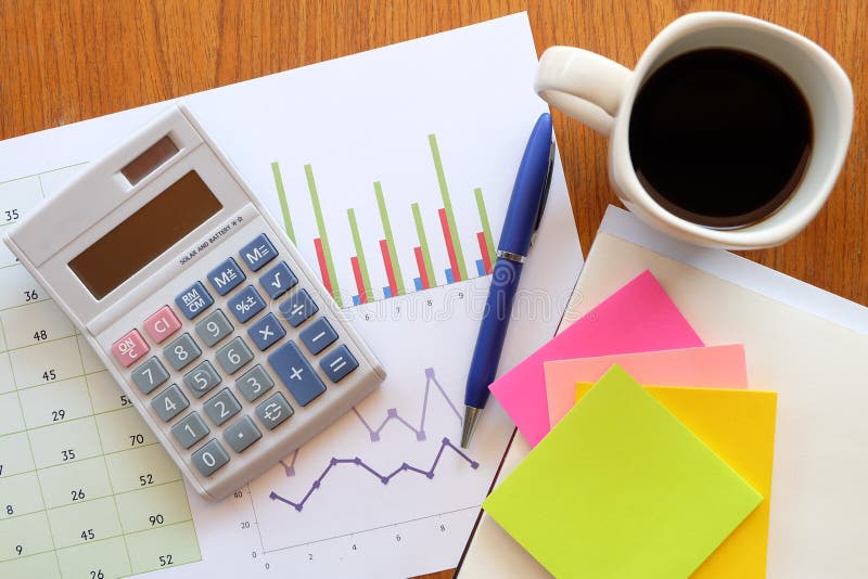 Graph paper and calculator stock image. Image of finance - 97420089