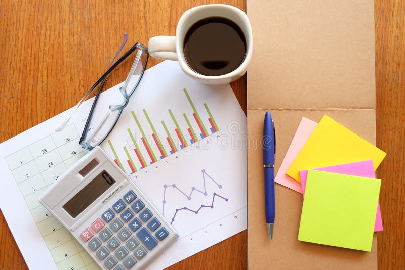 Graph paper and calculator stock photo. Image of figure - 97420132