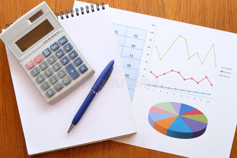 Graph paper and calculator stock image. Image of balance - 97420247