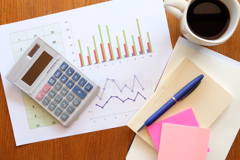 Graph paper and calculator stock photo. Image of balance - 97420538