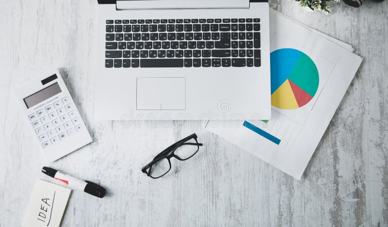 Graph on Paper with Computer Stock Photo - Image of laptop, analysis ...