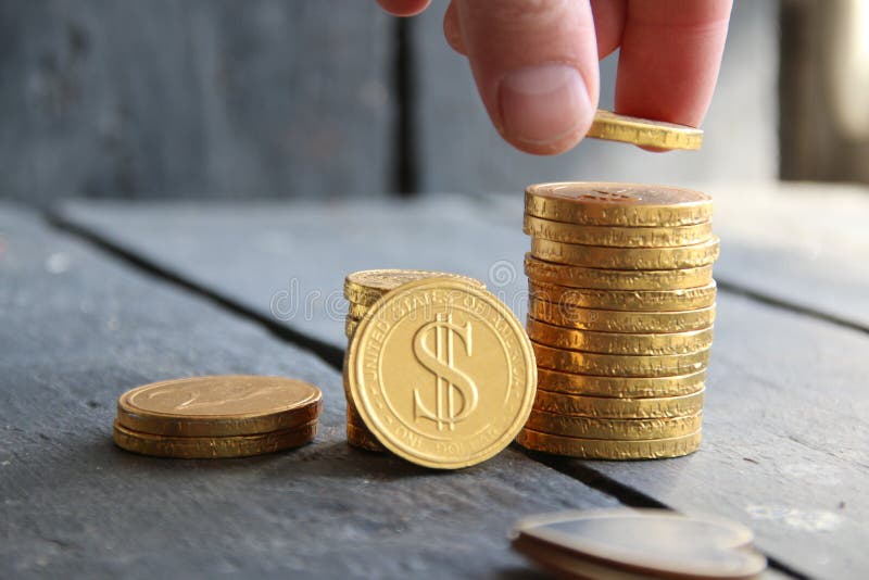 Graph of Profit from Gold Coins Stock Photo - Image of finance ...