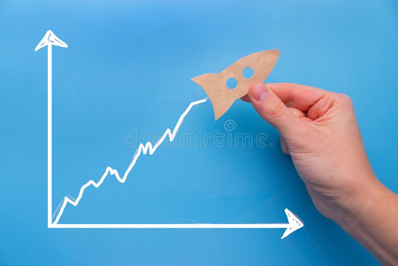 Graph Sketch and a Paper Rocket on it Stock Photo - Image of rocket ...