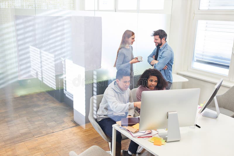 Graphic Design Team with Web Designer on Computer Stock Image - Image ...