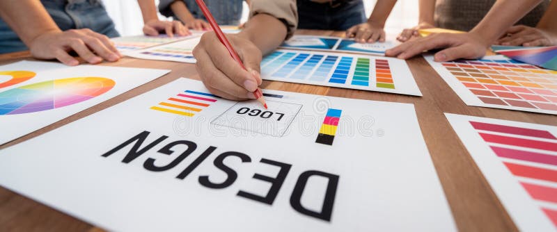 Graphic Designer Brainstorming Logo and Graphic Arts at Workshop ...