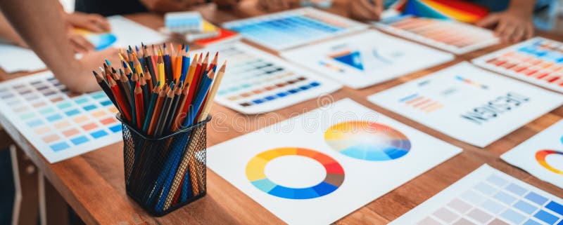 Graphic Designer Brainstorming Logo and Graphic Arts at Workshop ...