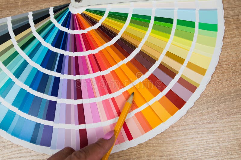 Graphic Designer Choosing Color from Sampler Stock Image - Image of ...