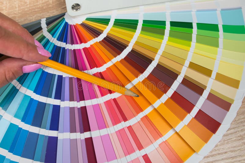 Graphic Designer Choosing Color from Sampler Stock Photo - Image of ...