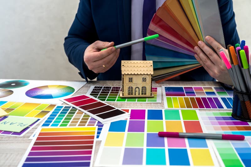 Graphic Designer Choosing a Color from a Sampler at Office. Man Hands ...