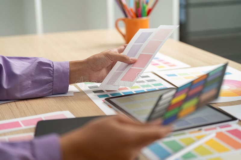 Graphic Designer Comparing Color Palettes in Creative Workspace Stock ...