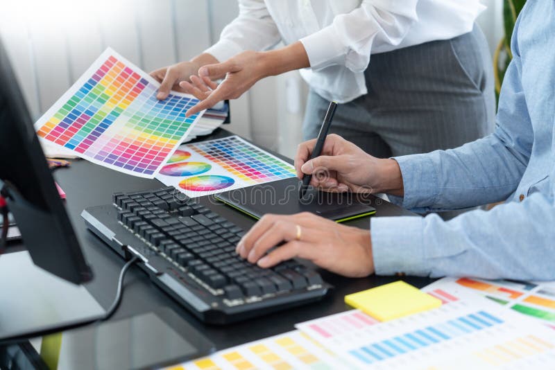 Graphic Designer or Creative Working Together Coloring Using Graphics ...