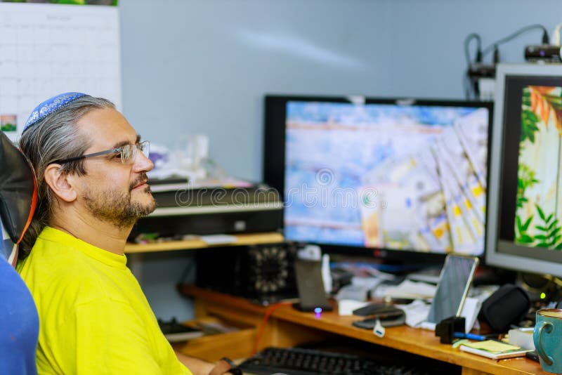 Jewish Man Designer Working on His Computer in a at Office Desk Wooden ...