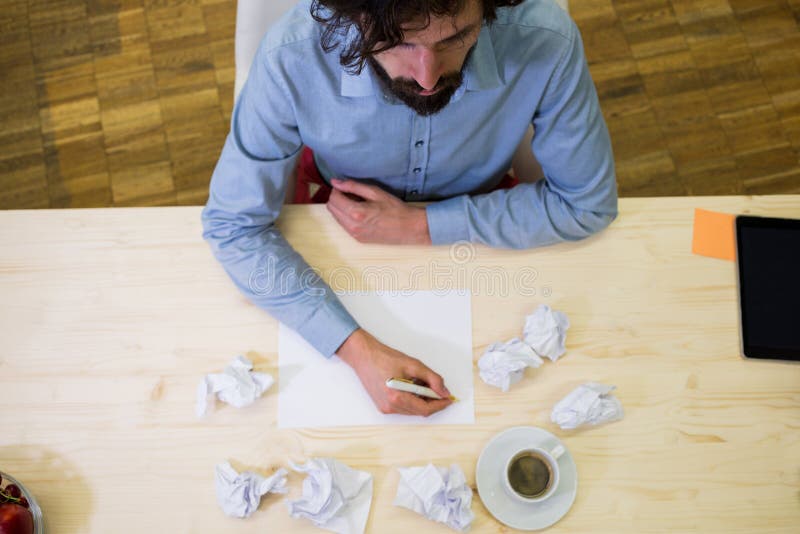 Graphic Designer Crumpling Paper at His Desk Stock Photo - Image of ...