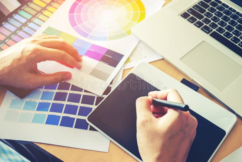 Graphic Designer Drawing on Graphics Tablet at Workplace Stock Photo ...