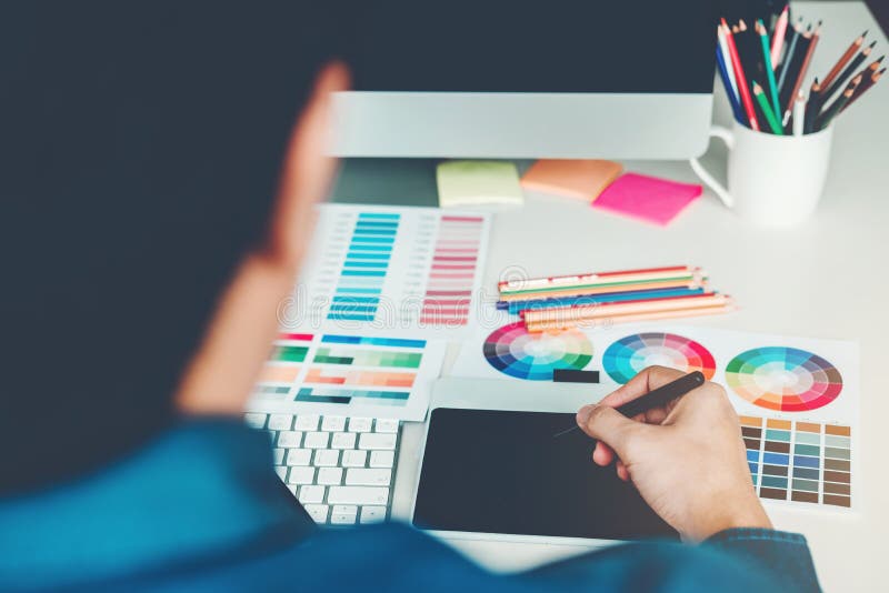 Graphic Designer Drawing on Graphics Tablet at Workplace Stock Image ...