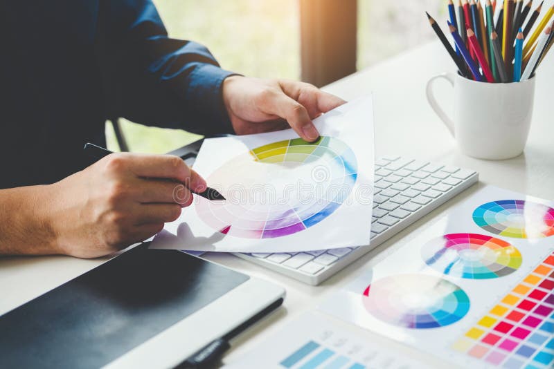 Graphic Designer Drawing on Graphics Tablet at Workplace Stock Photo ...