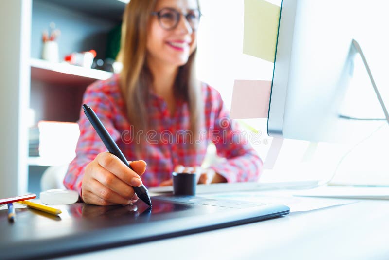 Graphic Designer Drawing Something on Graphic Tablet at the Work Stock ...