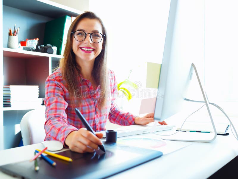 Graphic Designer Drawing Something on Graphic Tablet at the Work Stock ...