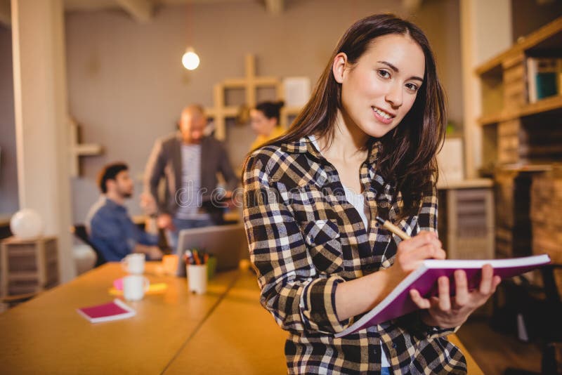 Graphic Designer Making Notes in Her Diary Stock Image - Image of ...