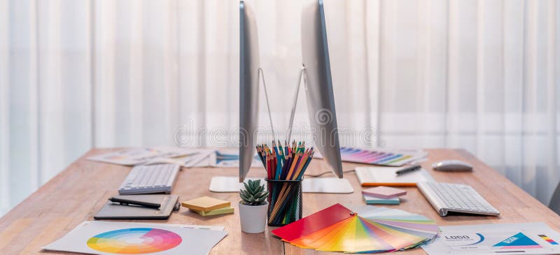 Graphic Designer& X27;s Workspace Features Color Palette and Laptop ...