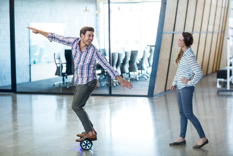 Graphic Designer Standing on Hoverboard Stock Photo - Image of ...