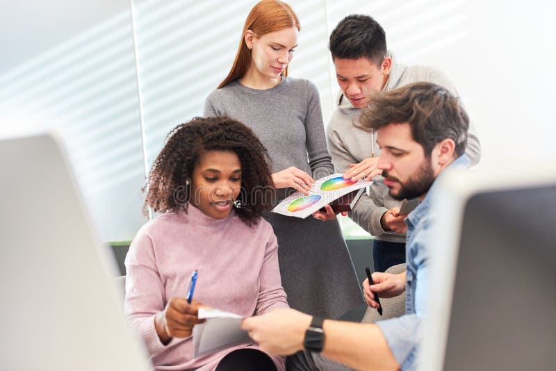Graphic Designer Team Discusses Design Project Stock Image - Image of ...