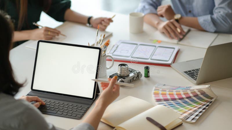 Graphic Designer Team Uses Laptops To Design New Projects for Customers ...