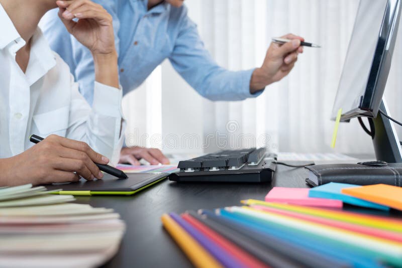 Graphic Designer Team Working on Web Design Using Color Swatches ...