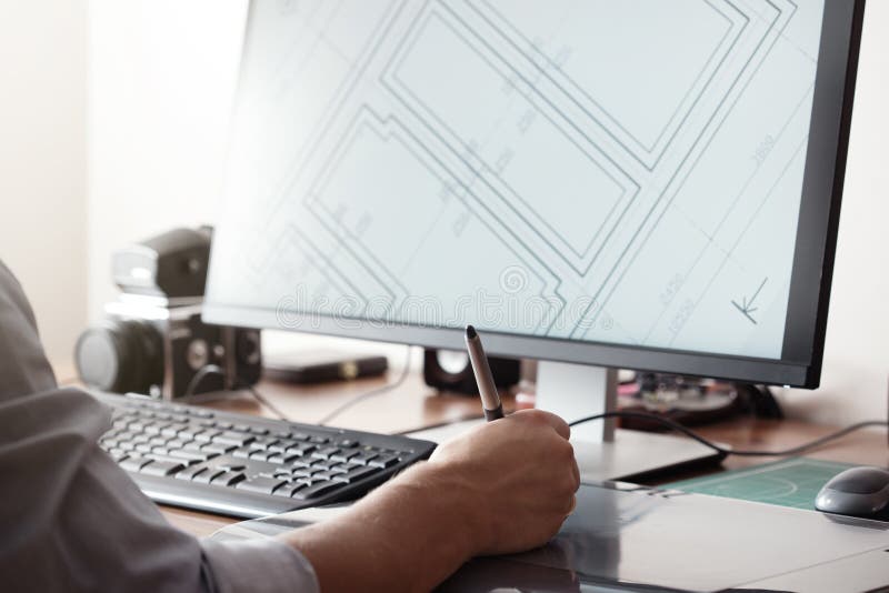 Graphic Designer Using Digital Tablet and Computer in Office or Home ...